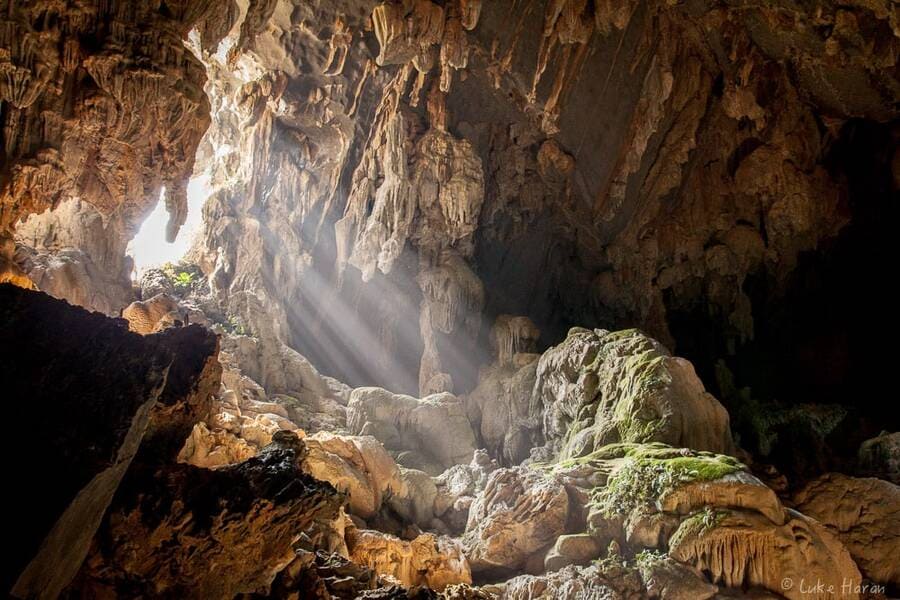 Tham Phu Kham Cave and Blue Lagoon - A Cave With A Bronze Buddha And A ...